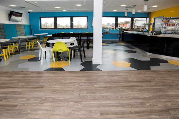 Polyflor luxury vinyl tiles create geometric floor design at Solihull ...